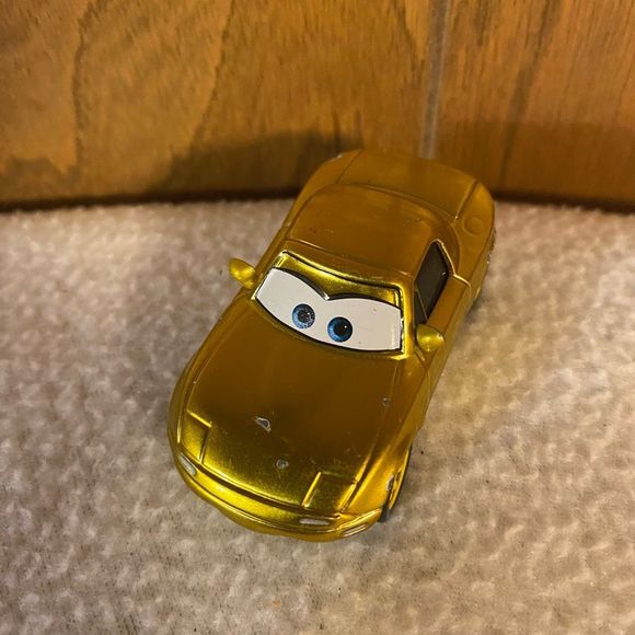 Disney | Toys | Disney Pixar Cars Gold Tia | Poshmark